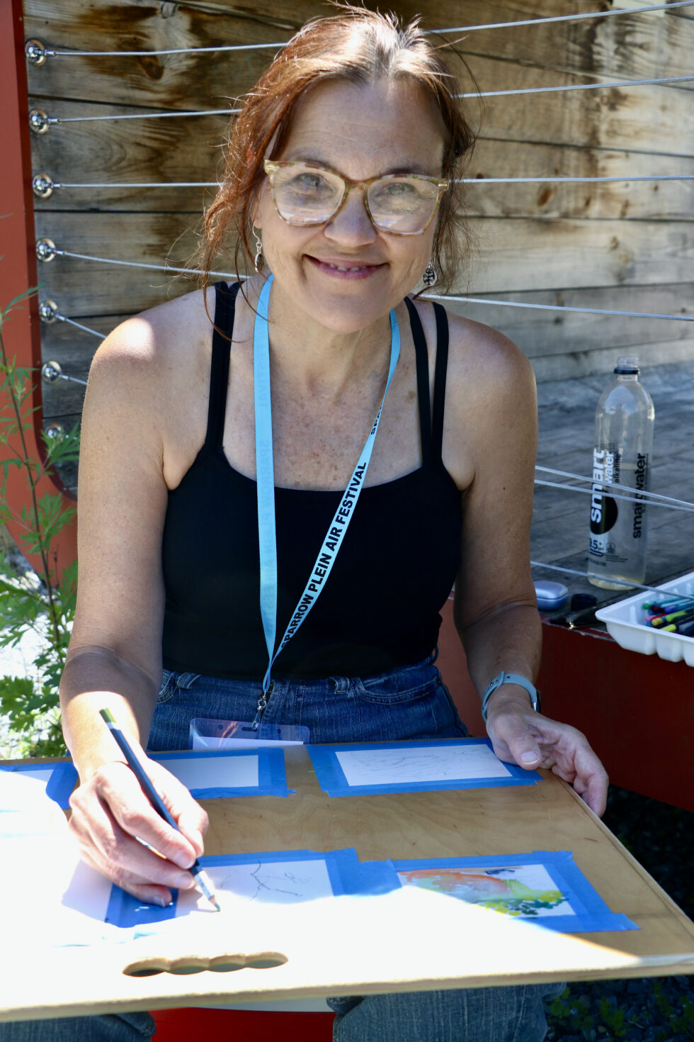 Susan Bruhl, of New Haven, was working on watercolors on Otter Creek at ...